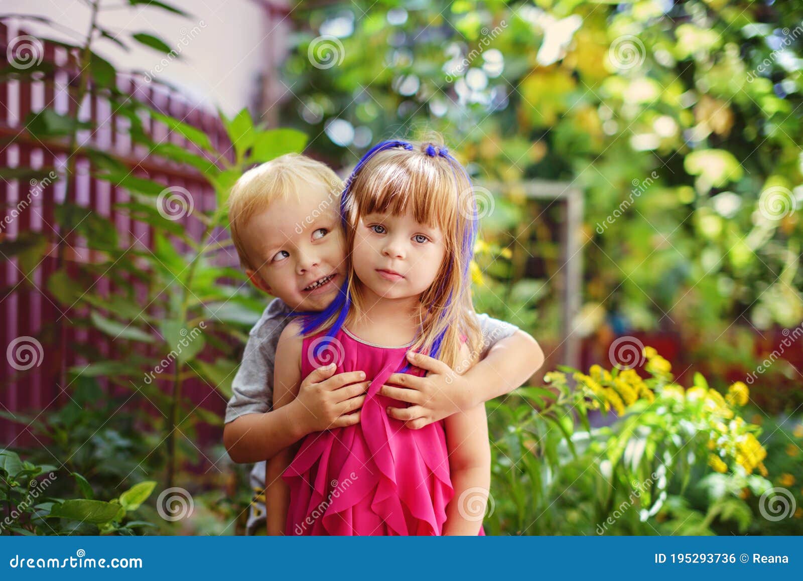 Two toddlers stock photo. Image of kids, green, girl - 195293736