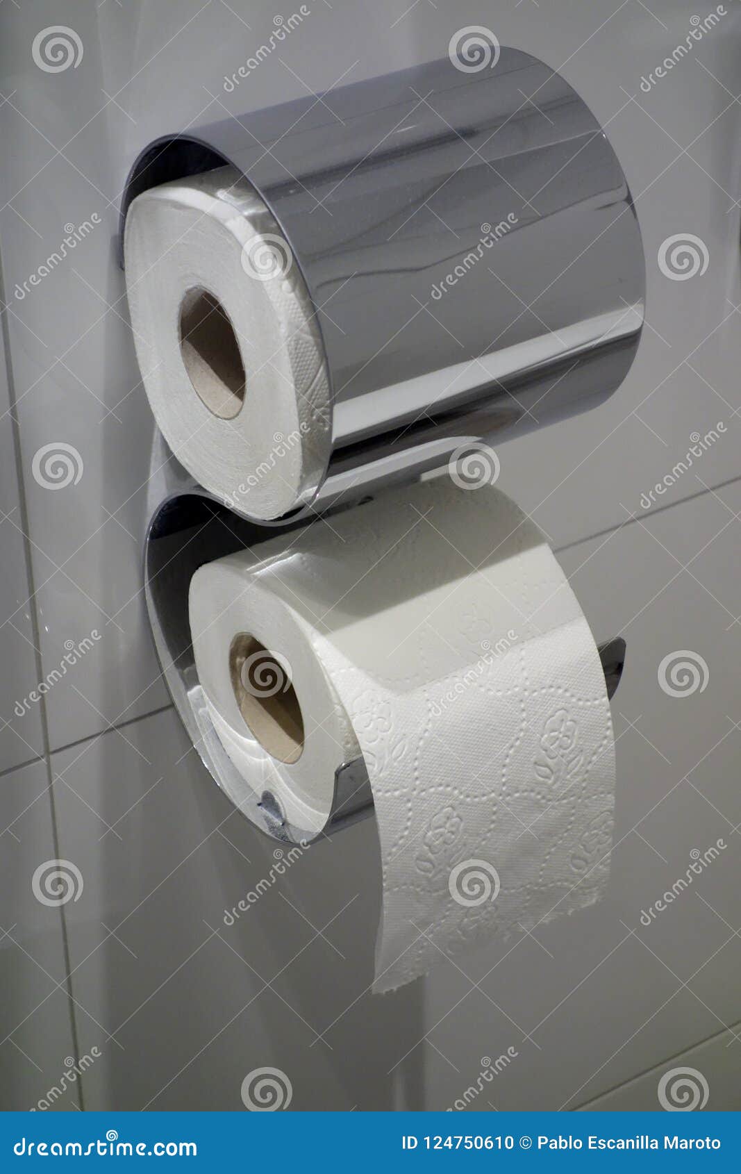 Two Toilet Paper on a Hotel Bathroom Wall Stock Photo - Image of ...
