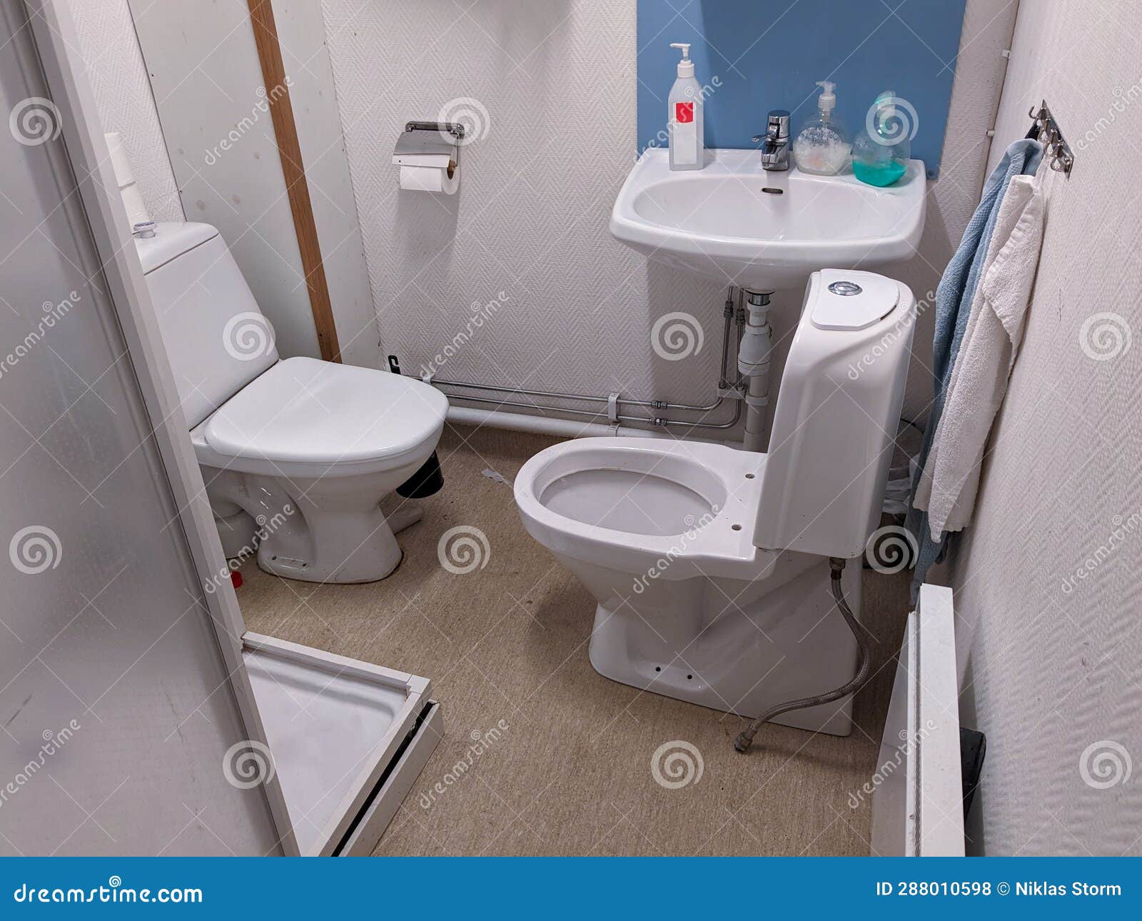 Two Toilets Inside a Restroom Stock Photo - Image of toilet, apartment ...