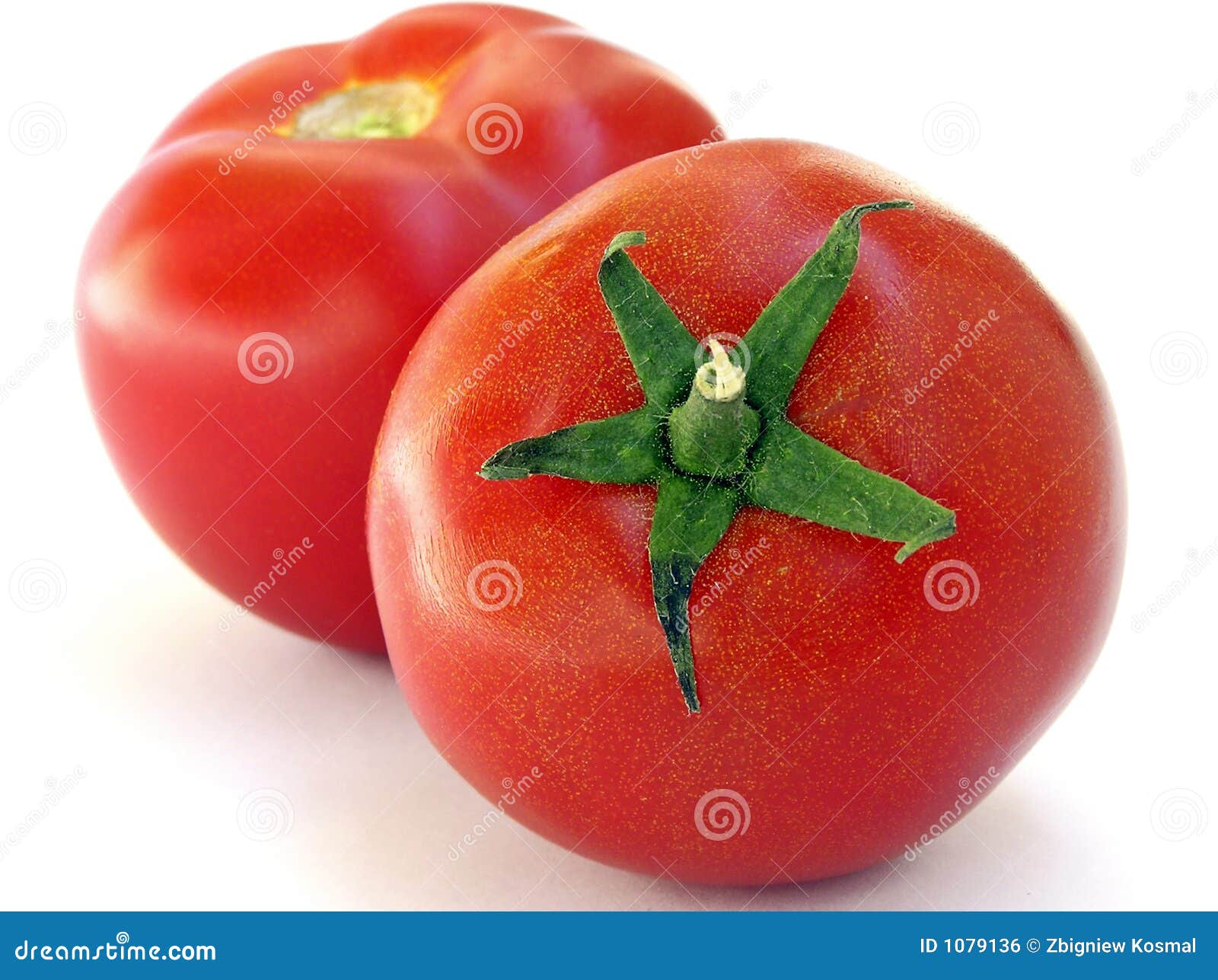 Two tomatoes stock photo. Image of flavor, green, flavoring - 1079136