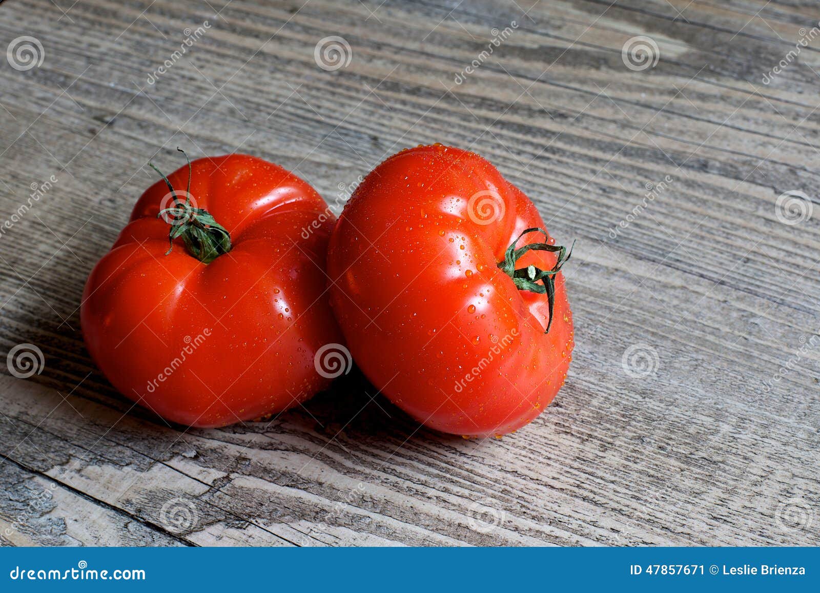 Two Tomatoes on Wood Table stock image. Image of healtcare - 47857671