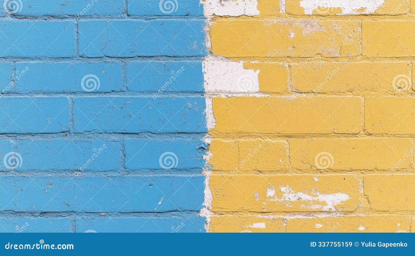 Two-tone Brick Wall Divided into Blue and Yellow Sections with Peeling ...