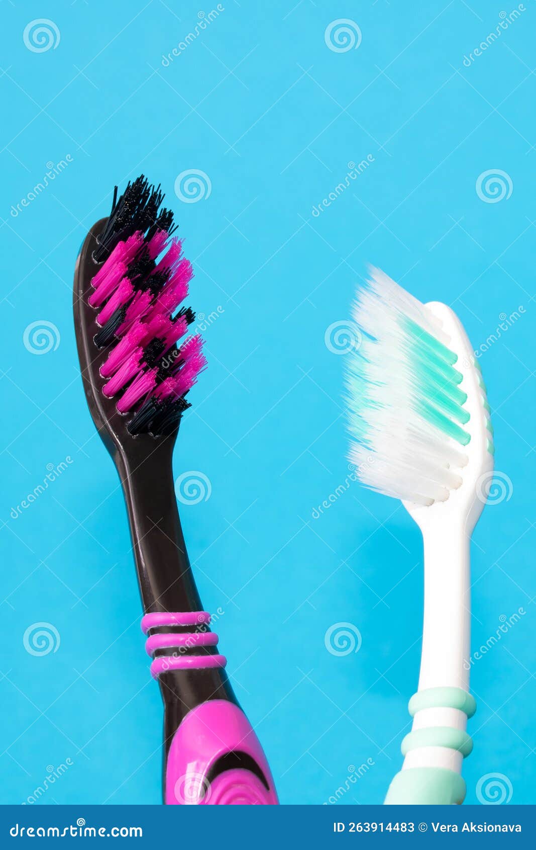 Two Toothbrushes on a Blue Background Closeup Stock Image - Image of ...