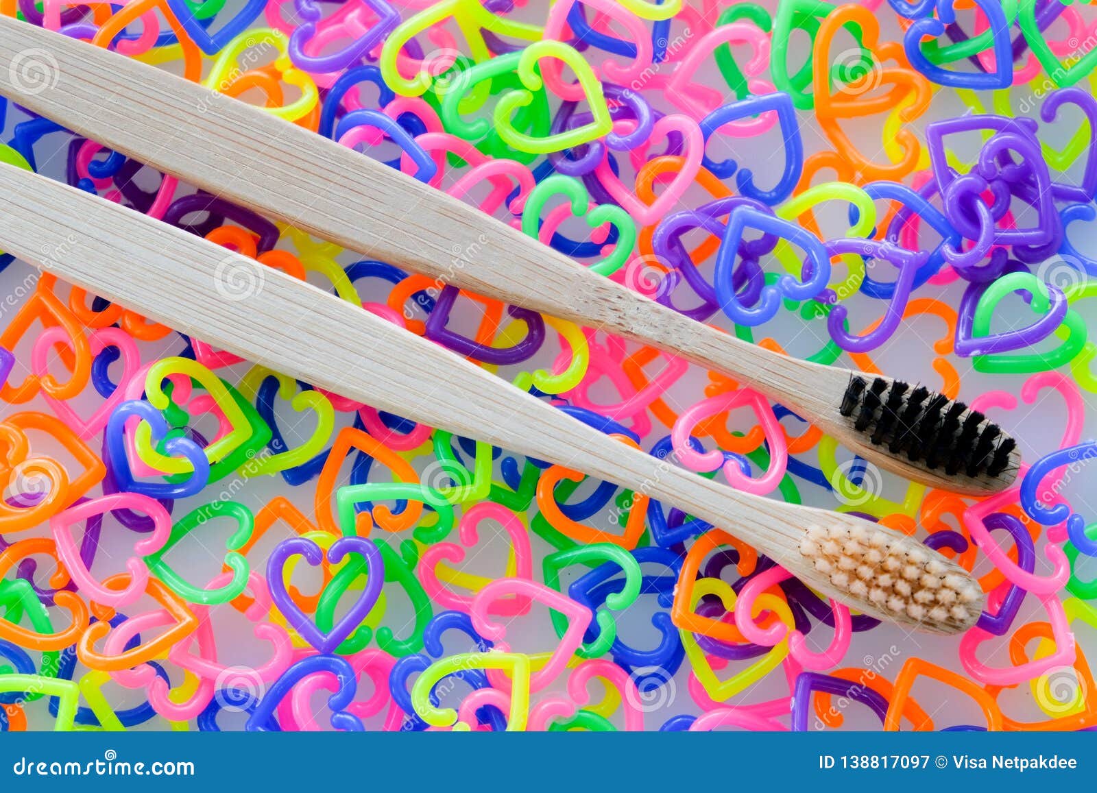 Two Toothbrushes on Colorful Mini Heart Toy Stock Image - Image of ...