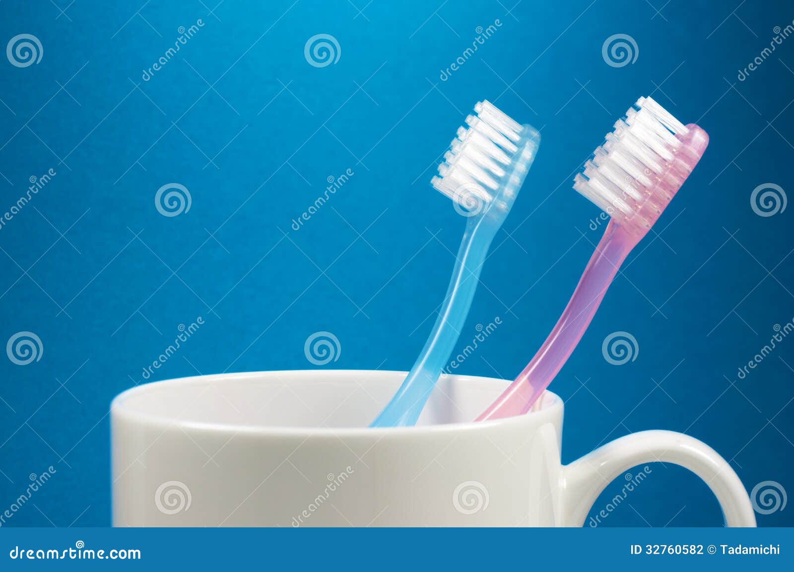 Two Toothbrushes and a Cup. (horizontal) Stock Photo - Image of brush ...