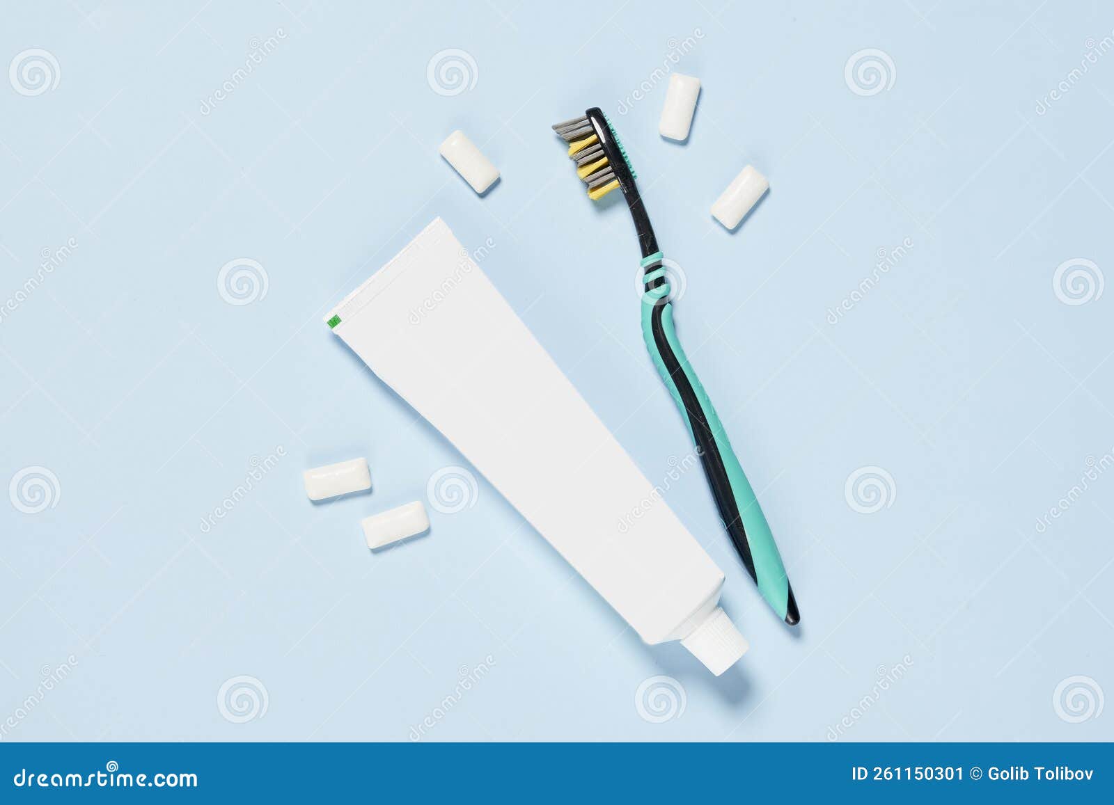 Two Toothbrushes and Toothpaste on a Paper Stock Image - Image of ...