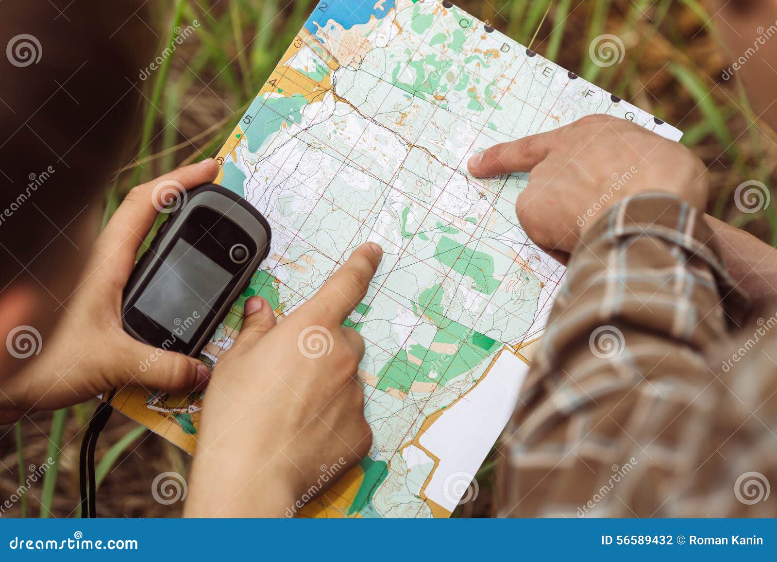 Two Tourist Determine the Route Map and Navigator Stock Photo - Image ...