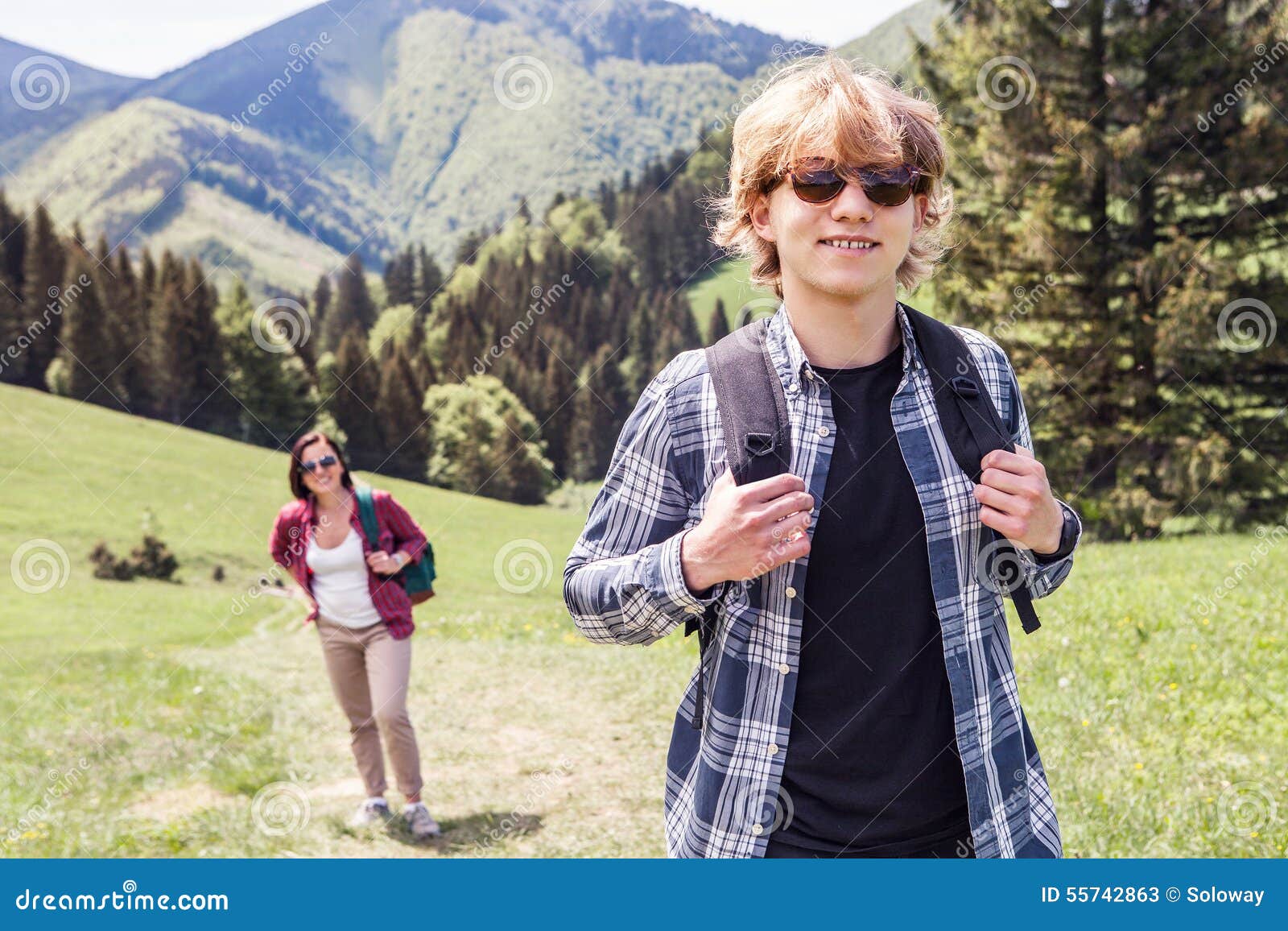 Two Tourists Going Up on the Mountain Hill Stock Image - Image of ...