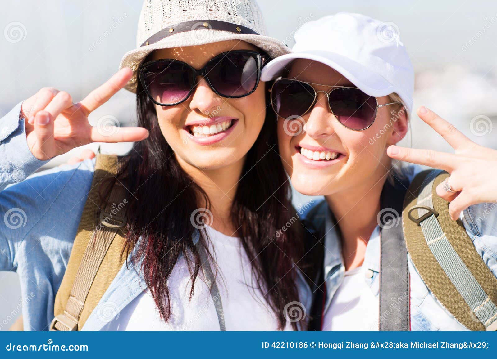 Two tourists posing stock photo. Image of pretty, girls - 42210186