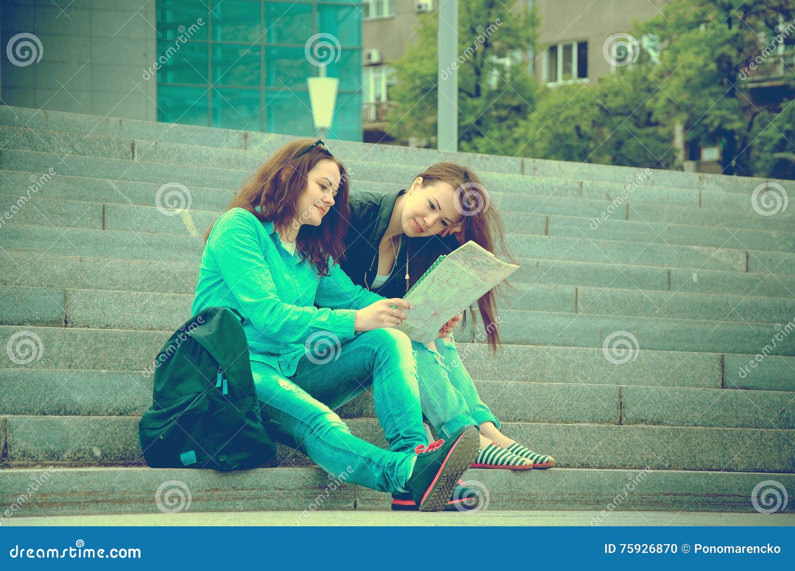 Two Tourists Resting on the Steps Stock Photo - Image of location ...