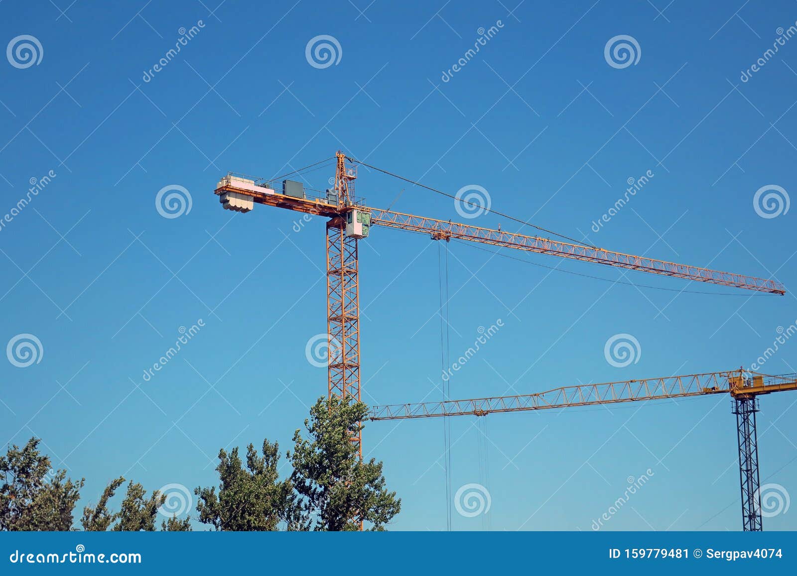Two Tower Cranes at a Construction Site Stock Image - Image of city ...