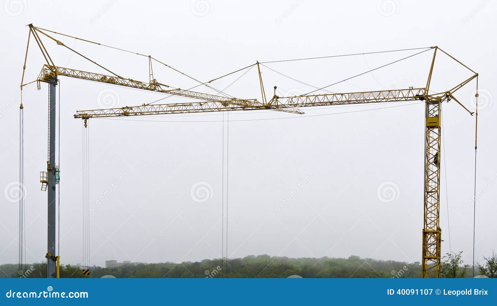 Two tower cranes stock image. Image of mast, crane, foggy - 40091107