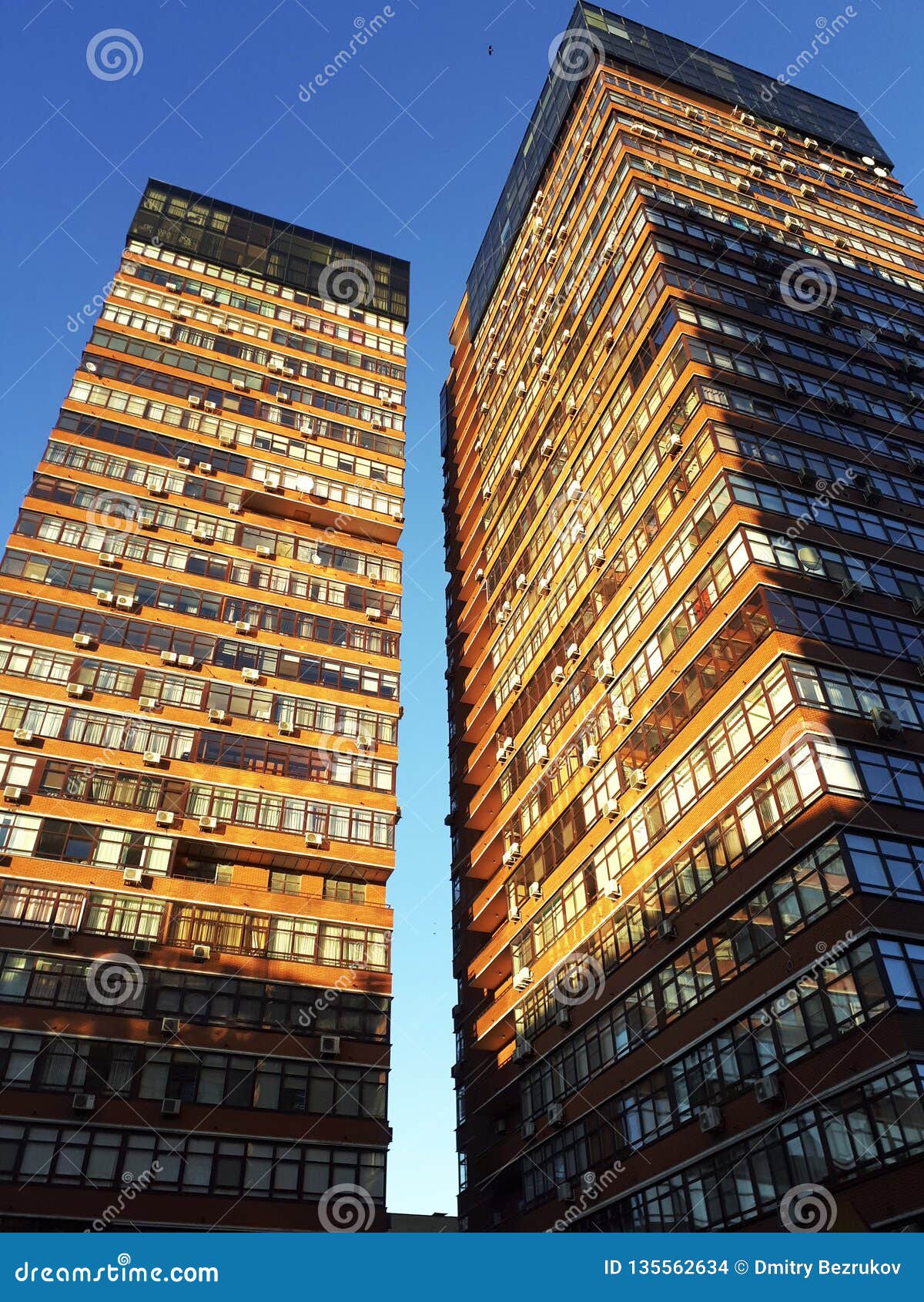 Two Towers of an Apartment Building from Below Against the Sky Stock ...