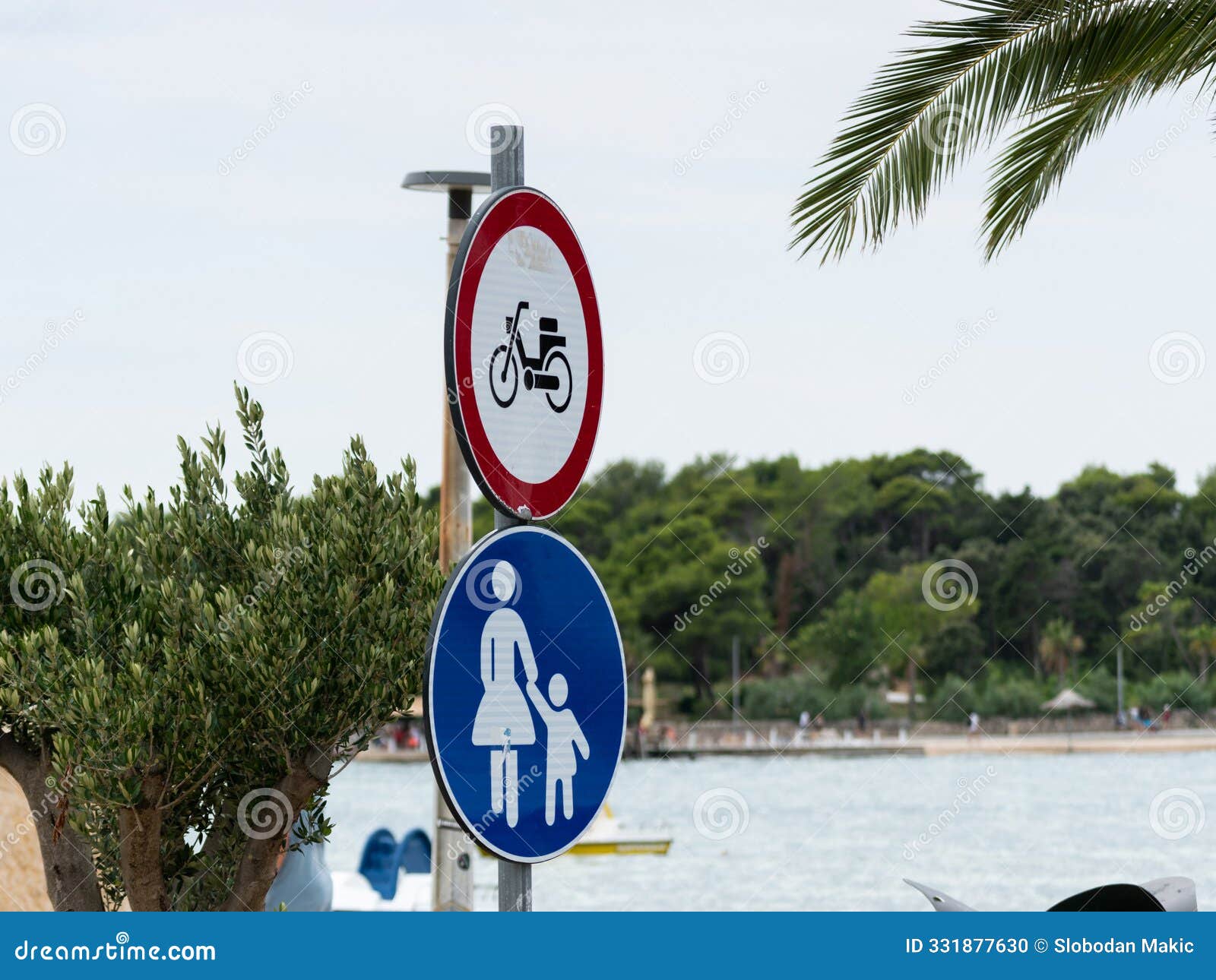 Two traffic signs stock photo. Image of novalja, moped - 331877630