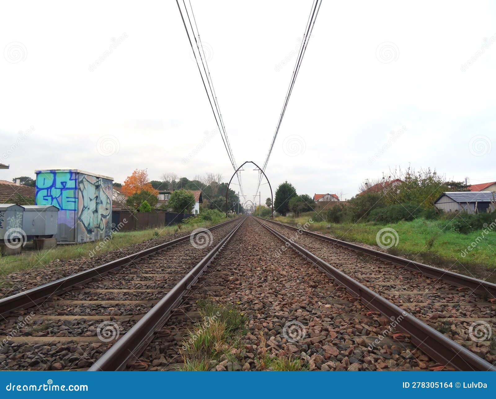Two Train Lines for Electric Charging Stock Photo - Image of waterway ...