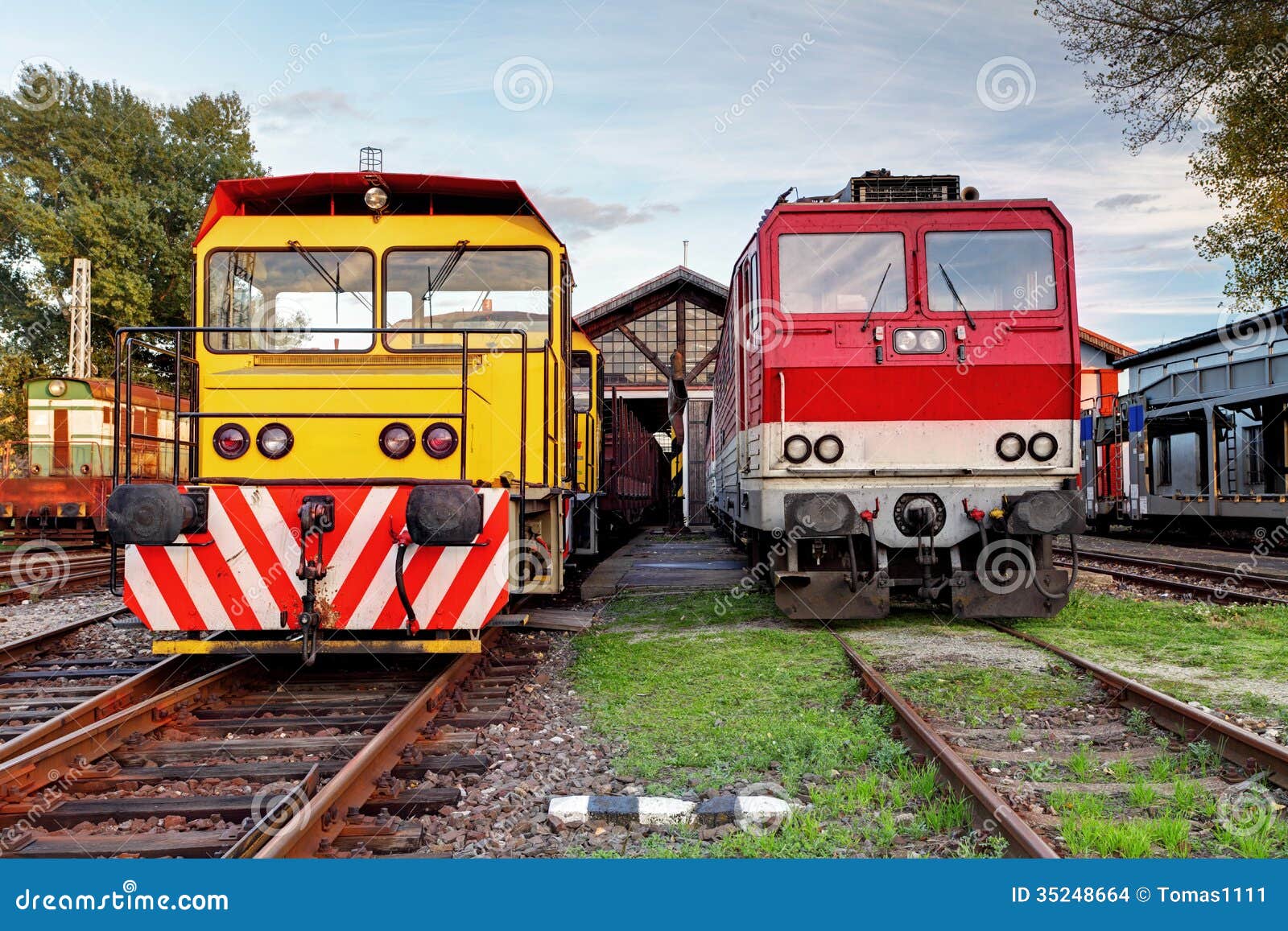 Two trains in depot stock photo. Image of bright, power - 35248664