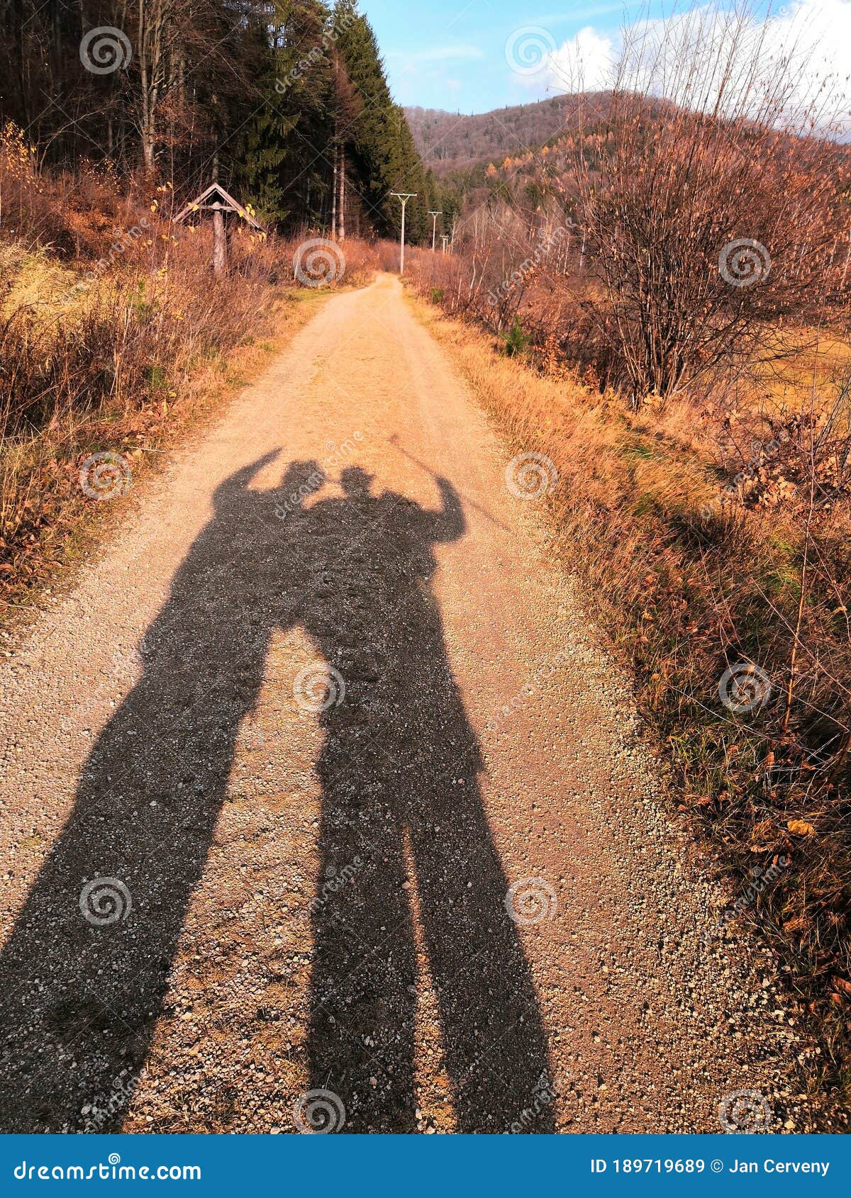 Two tramps on a long road stock image. Image of track - 189719689
