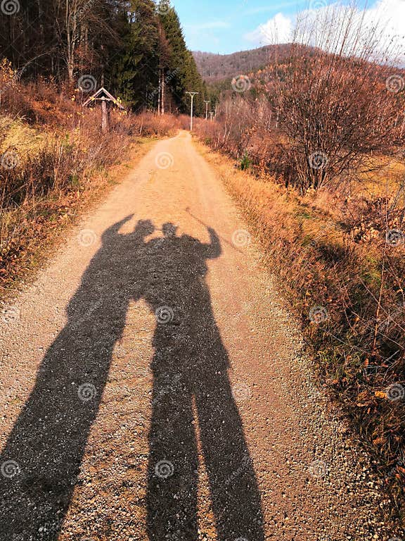 Two tramps on a long road stock image. Image of track - 189719689