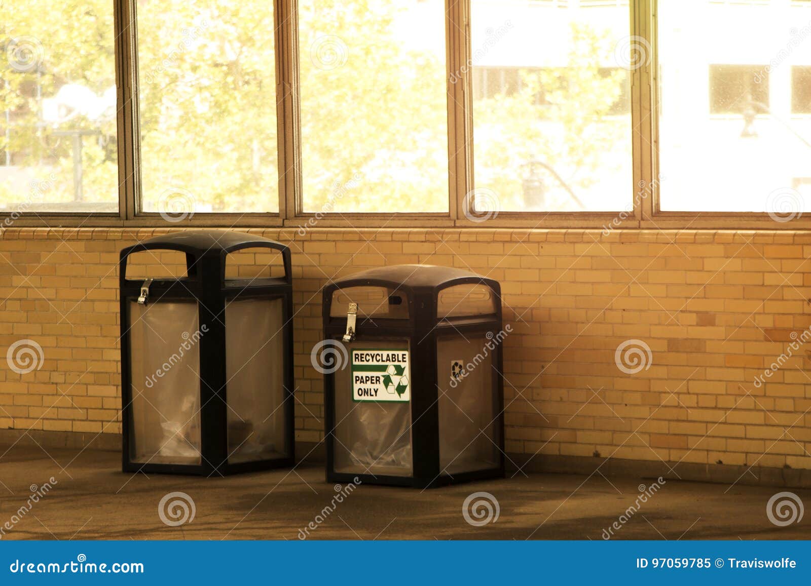 Two trash bins near window stock image. Image of effort - 97059785