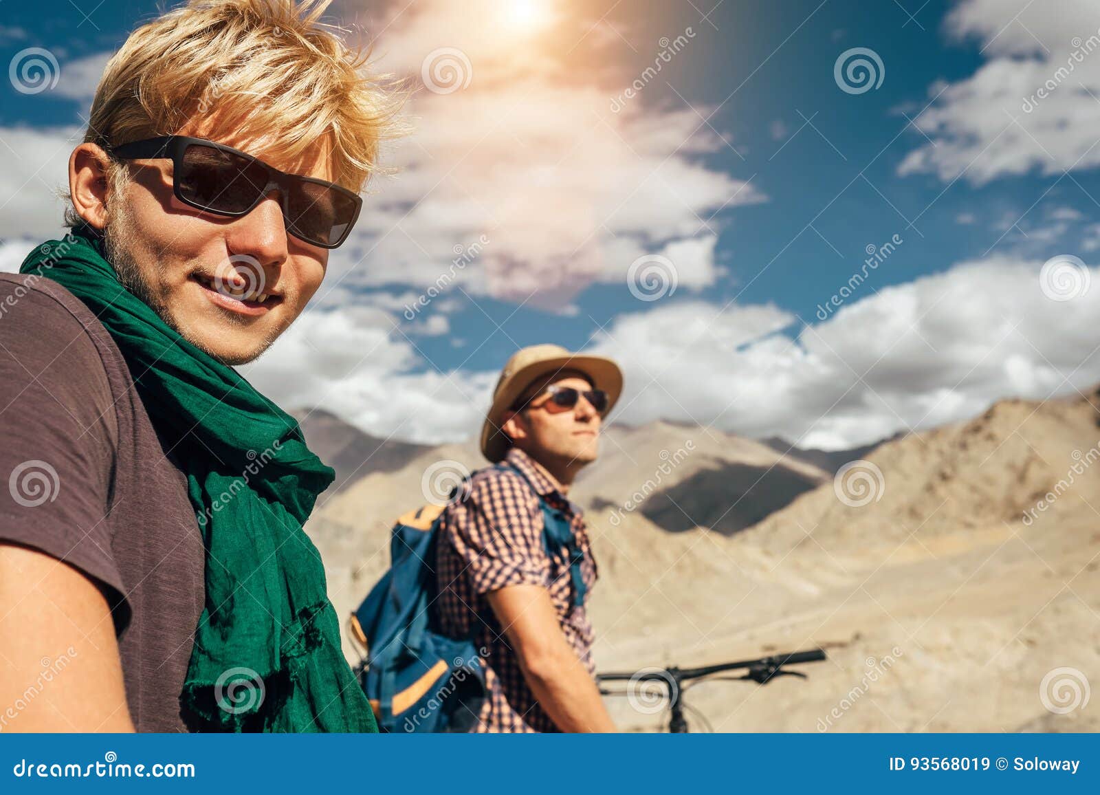 Two Travelers on Bycikles in High Mountain Stock Image - Image of ...