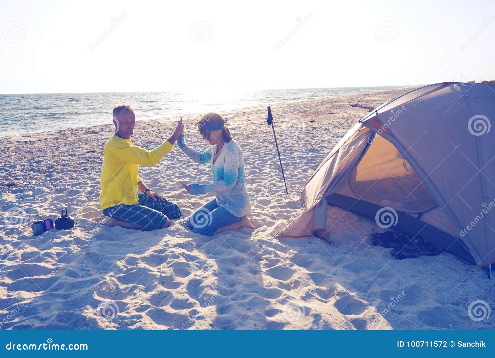 Two Travelers Get Joyful News with Using a Tablet Pc Stock Photo ... Two Travelers Get Joyful News with Using a Tablet Pc Stock Photo ...