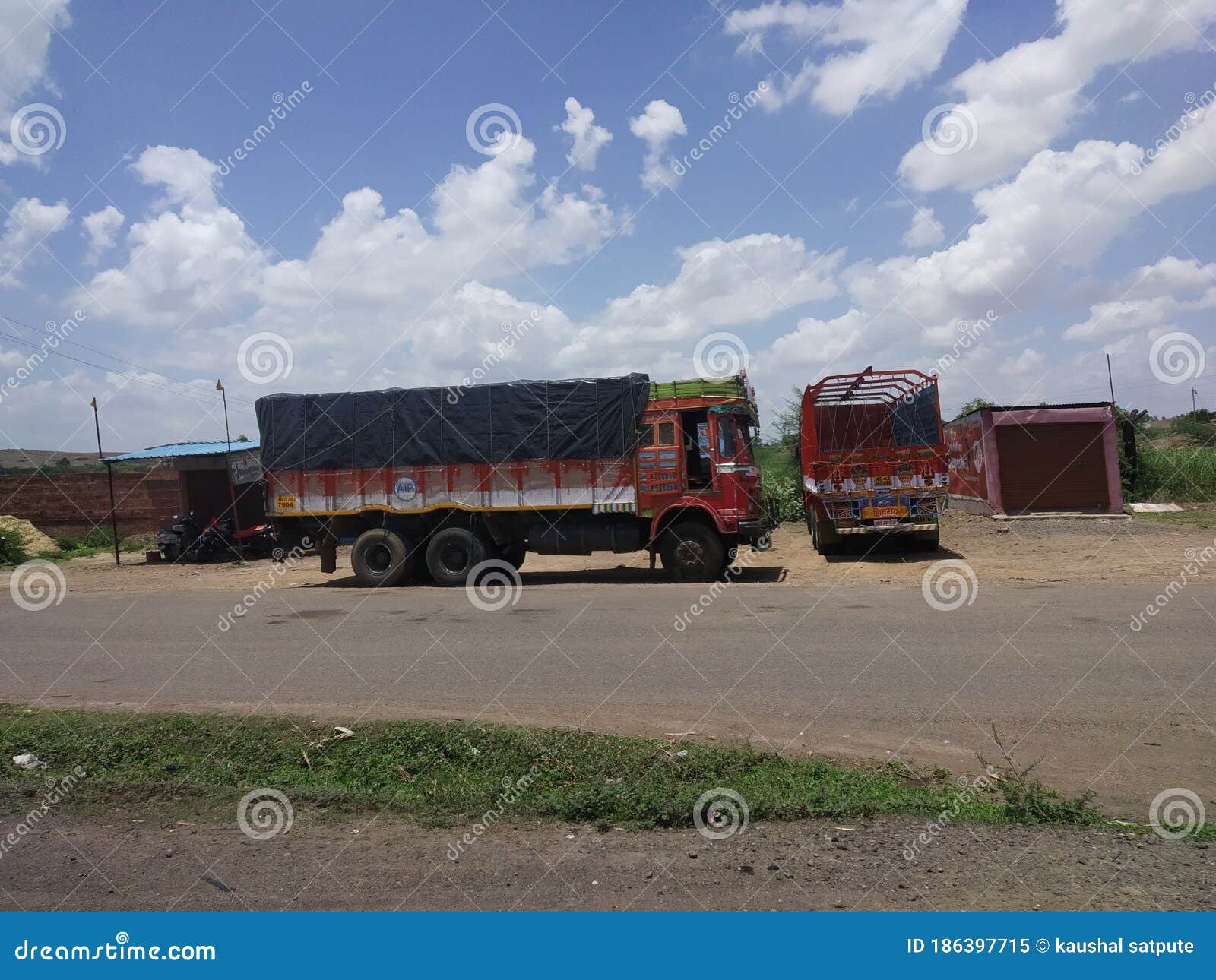 Two Trucks on Road editorial image. Image of asphalt - 186397715