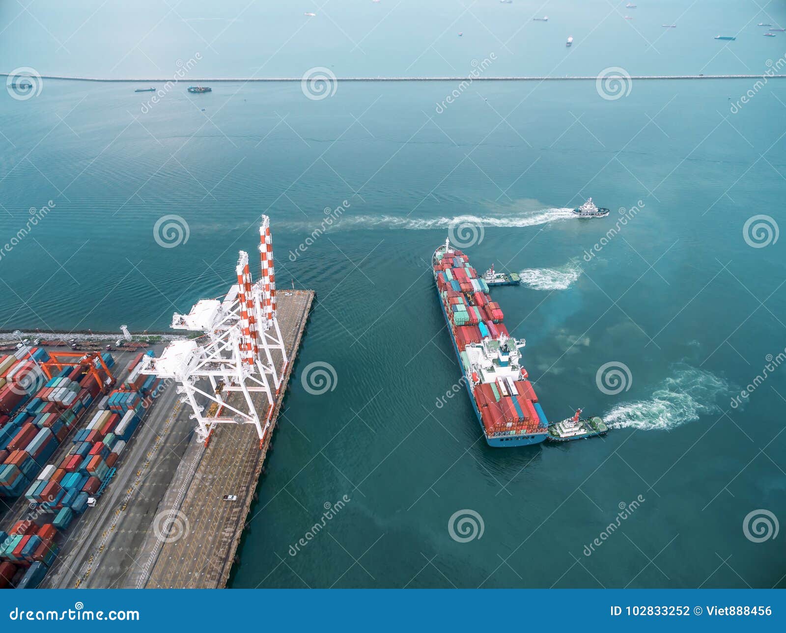 Two Tug Boat Towing Cargo Container in Warehouse Harbor at Thailand ...
