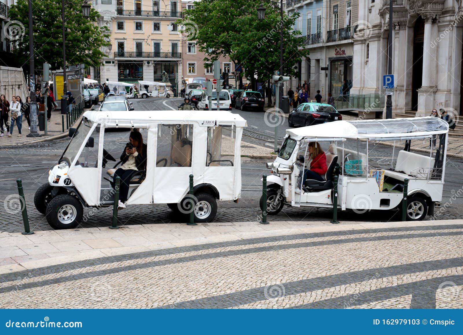 Two Tuk Tuks with Drivers Waiting for Tourists in the Centre of the ... Two Tuk Tuks with Drivers Waiting for Tourists in the Centre of the ...