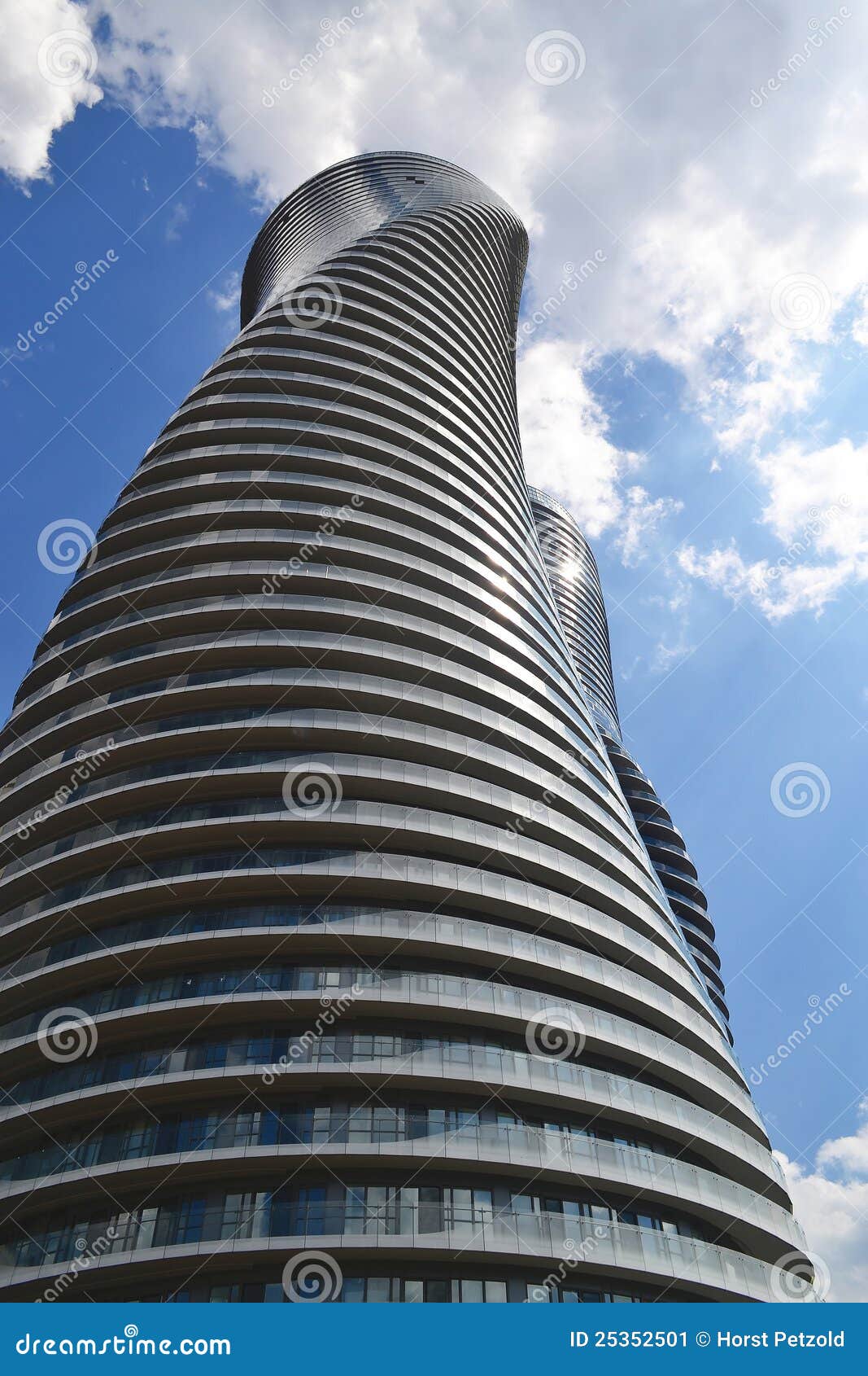Two twisted towers. stock image. Image of facade, blue - 25352501