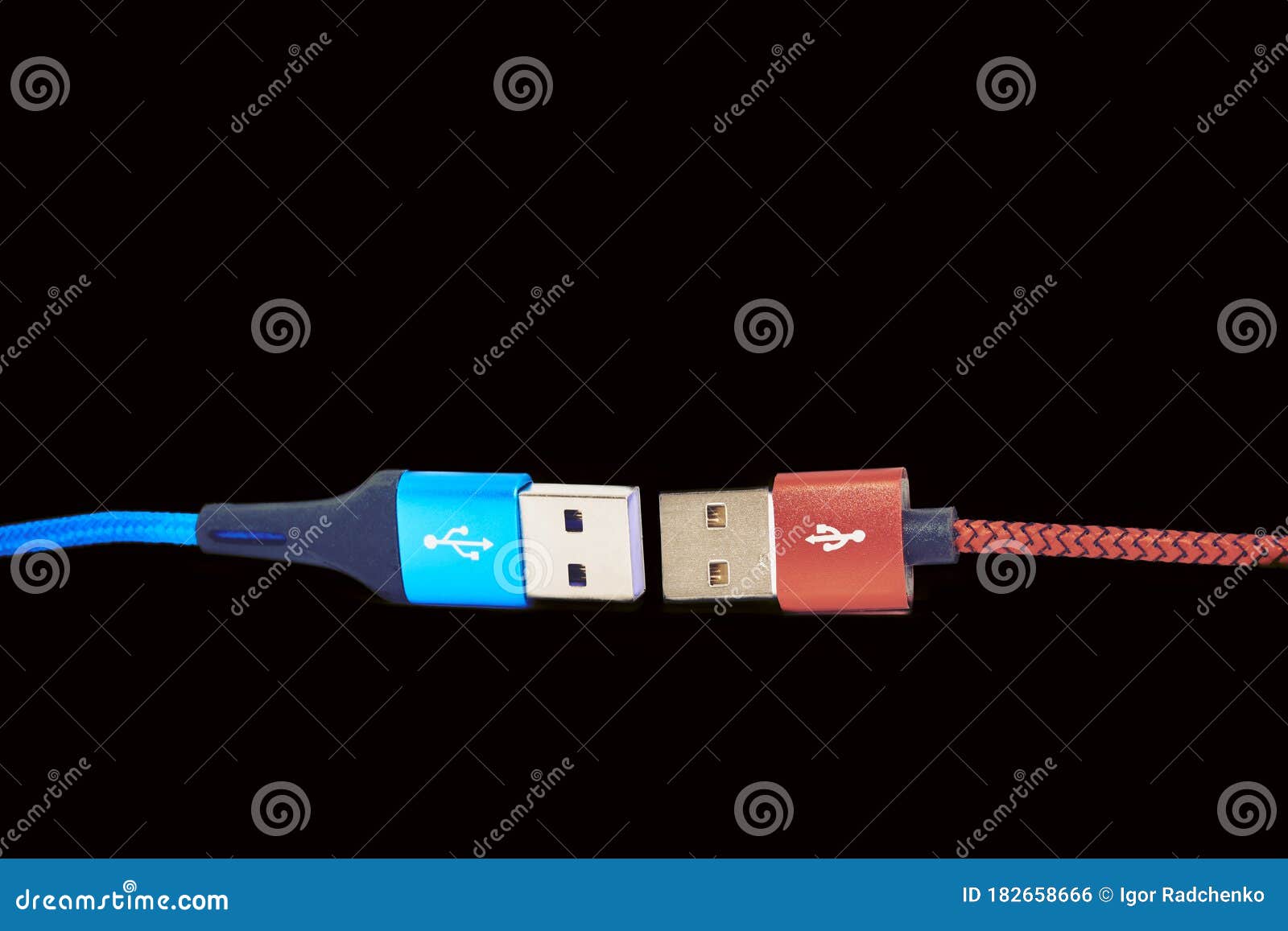 Two Universal Serial Bus Cables on a Black Background Stock Photo ...
