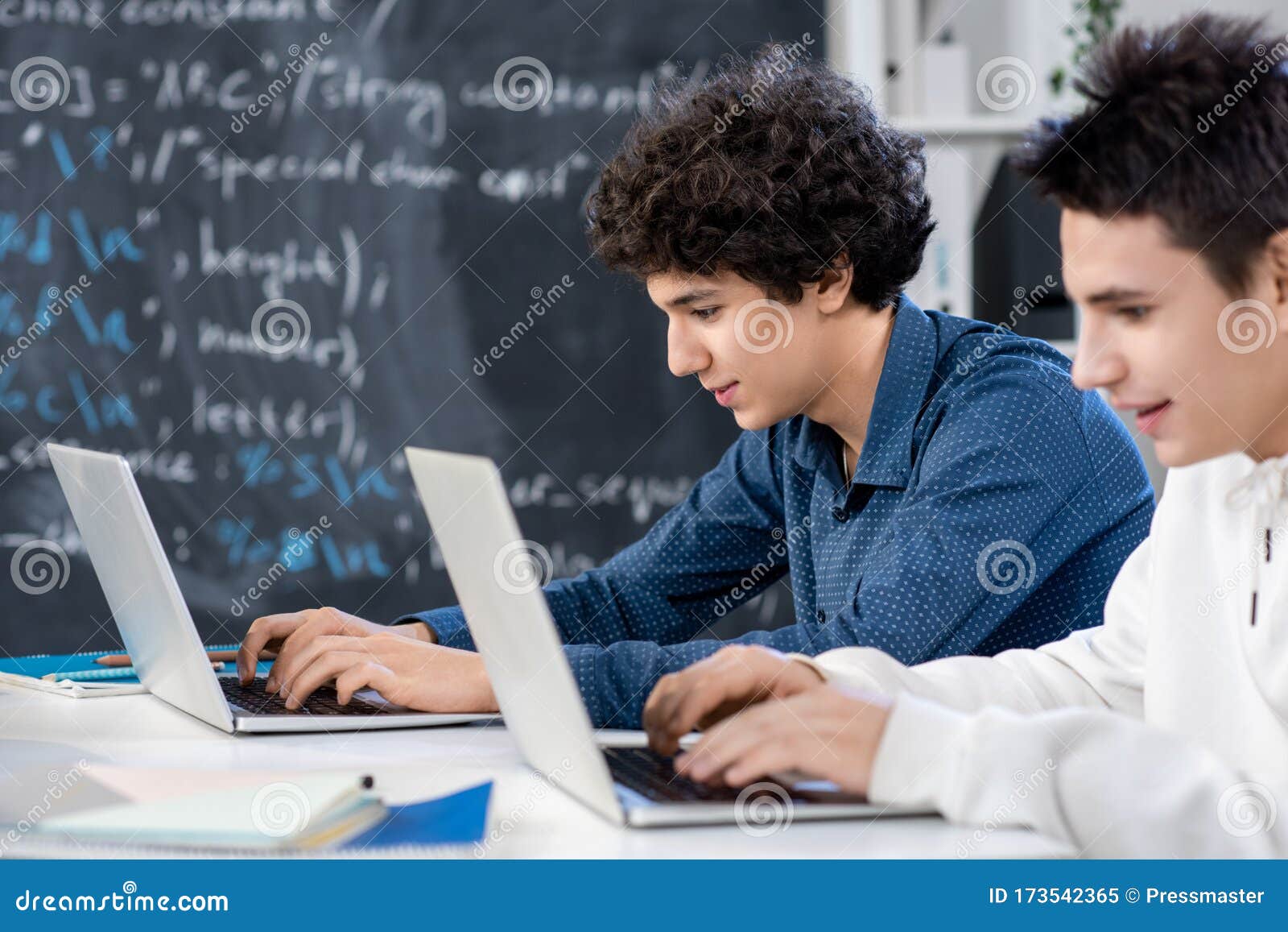 Two University Students Scrolling through Online Information for Their ...