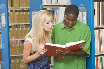 Two University Students Working in Library Stock Photo - Image of ...
