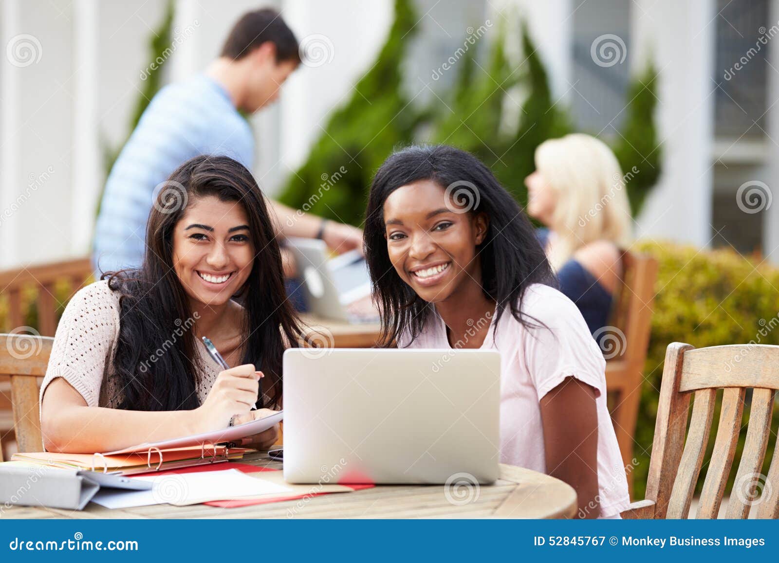 Two University Students Working on Project Outdoors Together Stock ...
