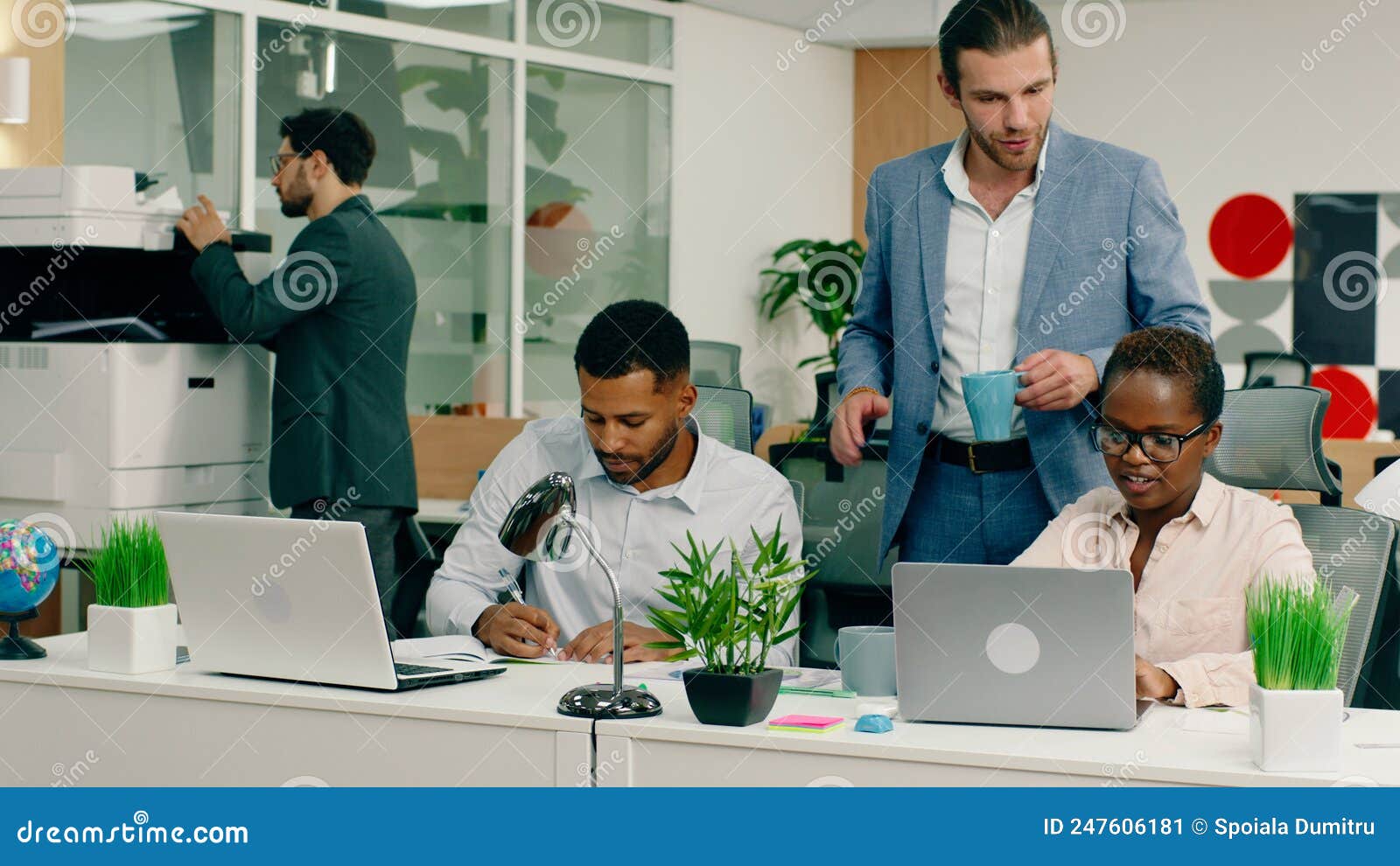 Two Very Good Looking Co- Workers are in the Office, Having a ...