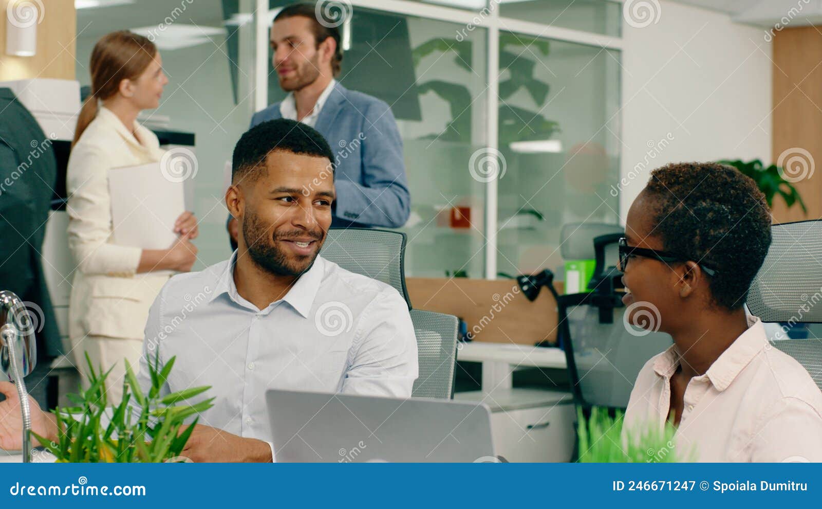 Two Very Good Looking Co- Workers are in the Office, Having a ...