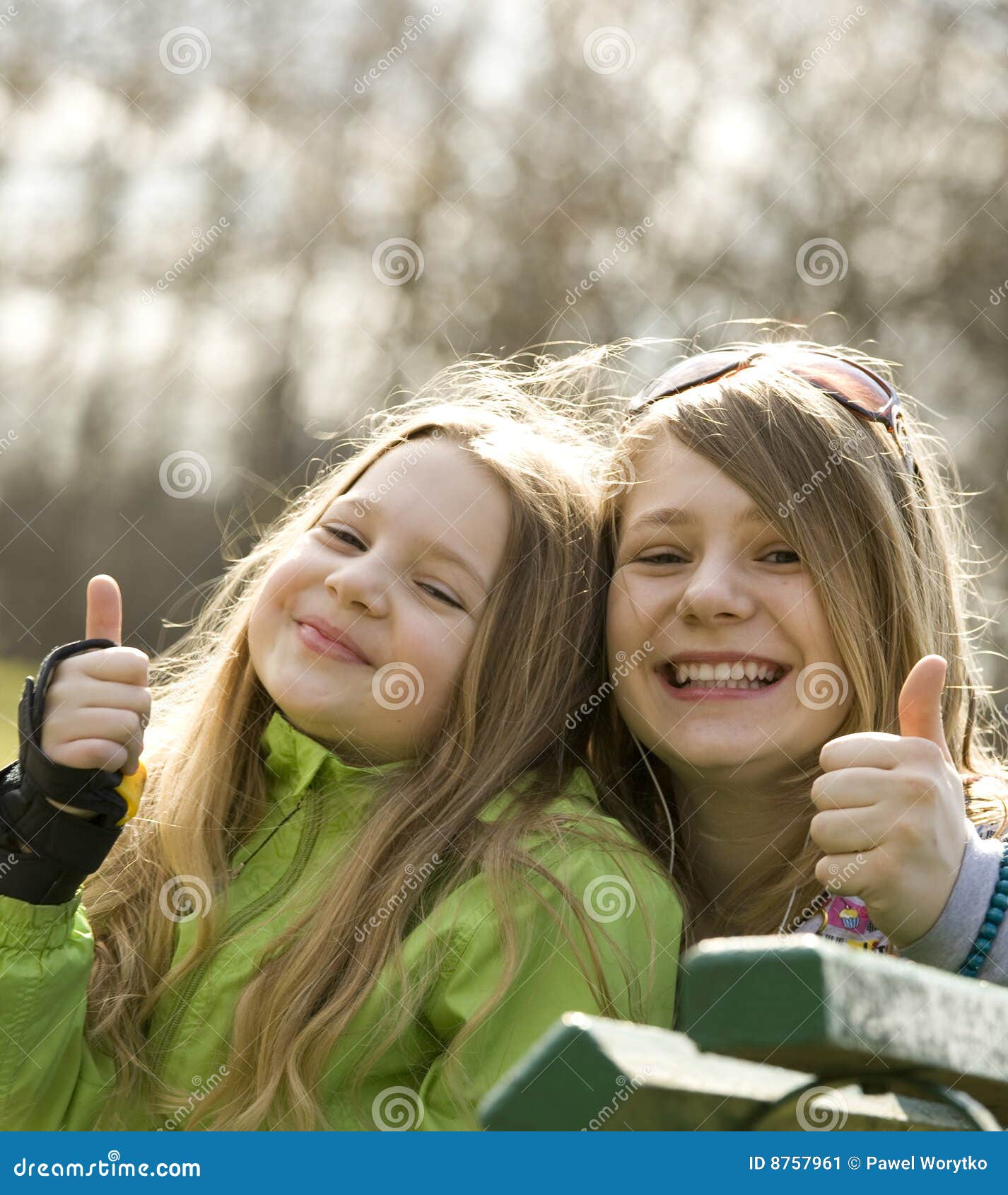 Two Very Happy Grils in a Park Stock Image - Image of sunny, green: 8757961