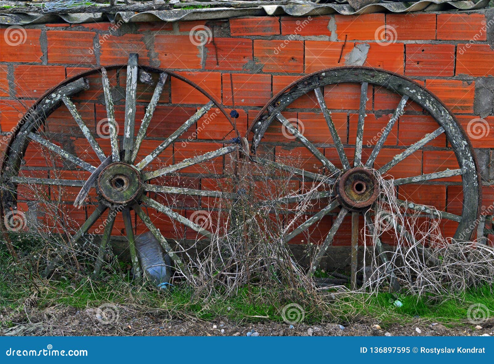 Two very old wheels stock image. Image of ride, open - 136897595