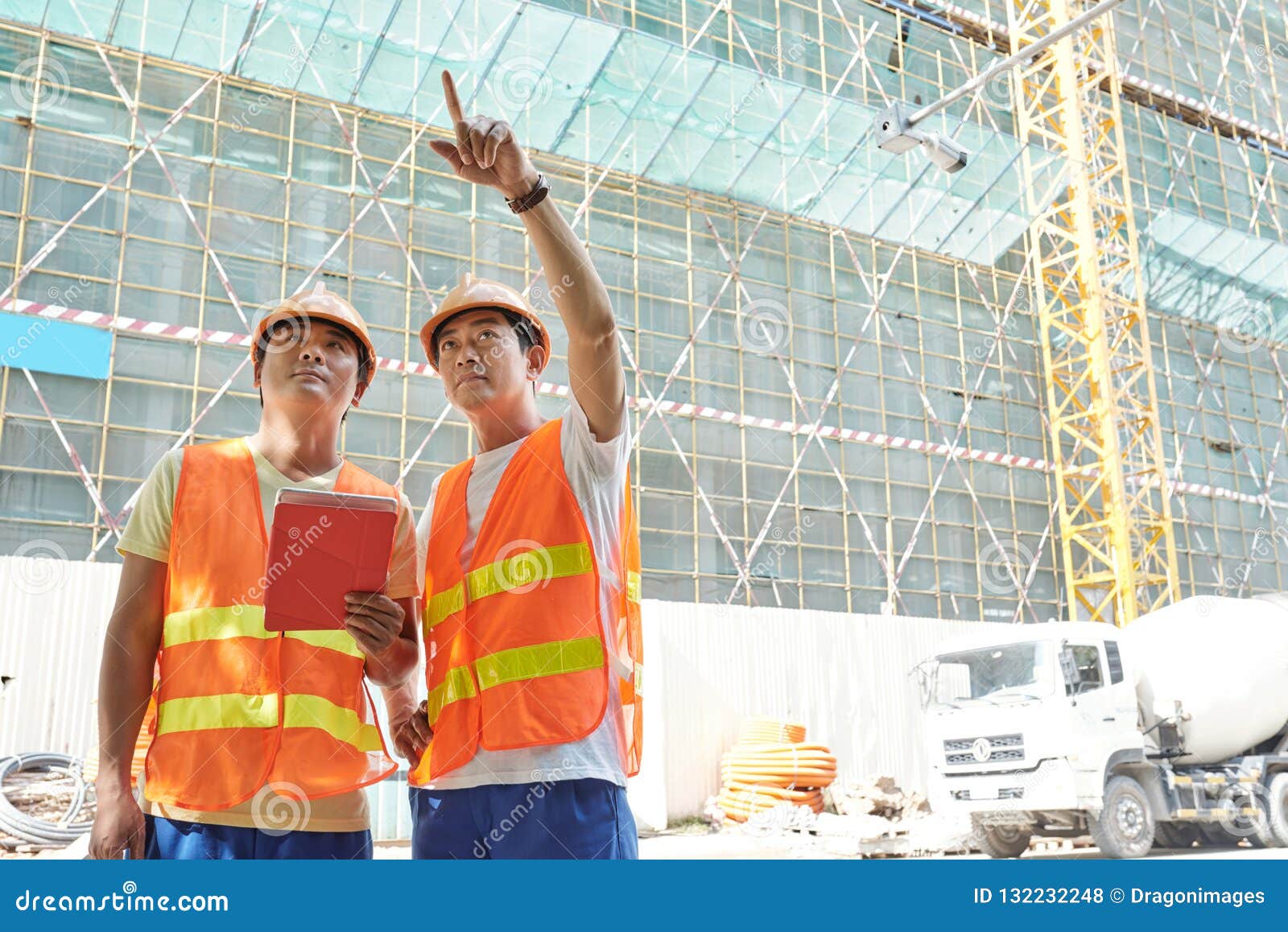 Engineers Discussing Work Outdoors Stock Photo - Image of builder ...