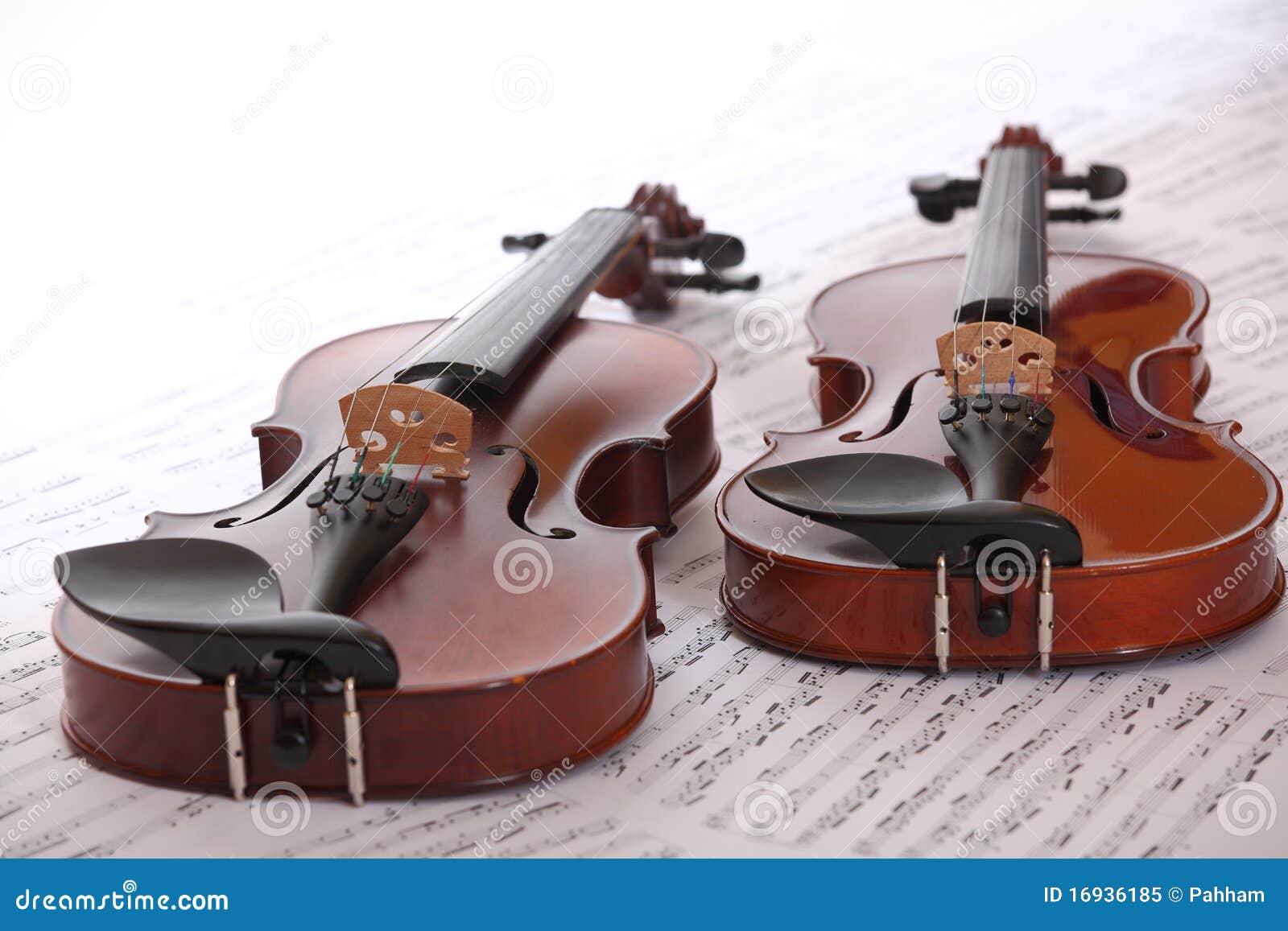 Two violins stock image. Image of white, antique, classical - 16936185