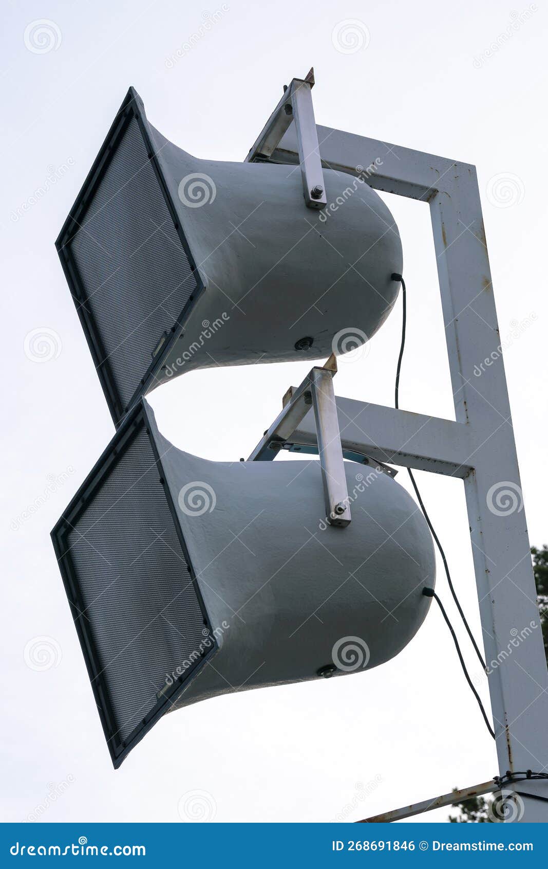 Two Voice Announcement Horns Against a Cloudy Sky. Stock Photo - Image ...