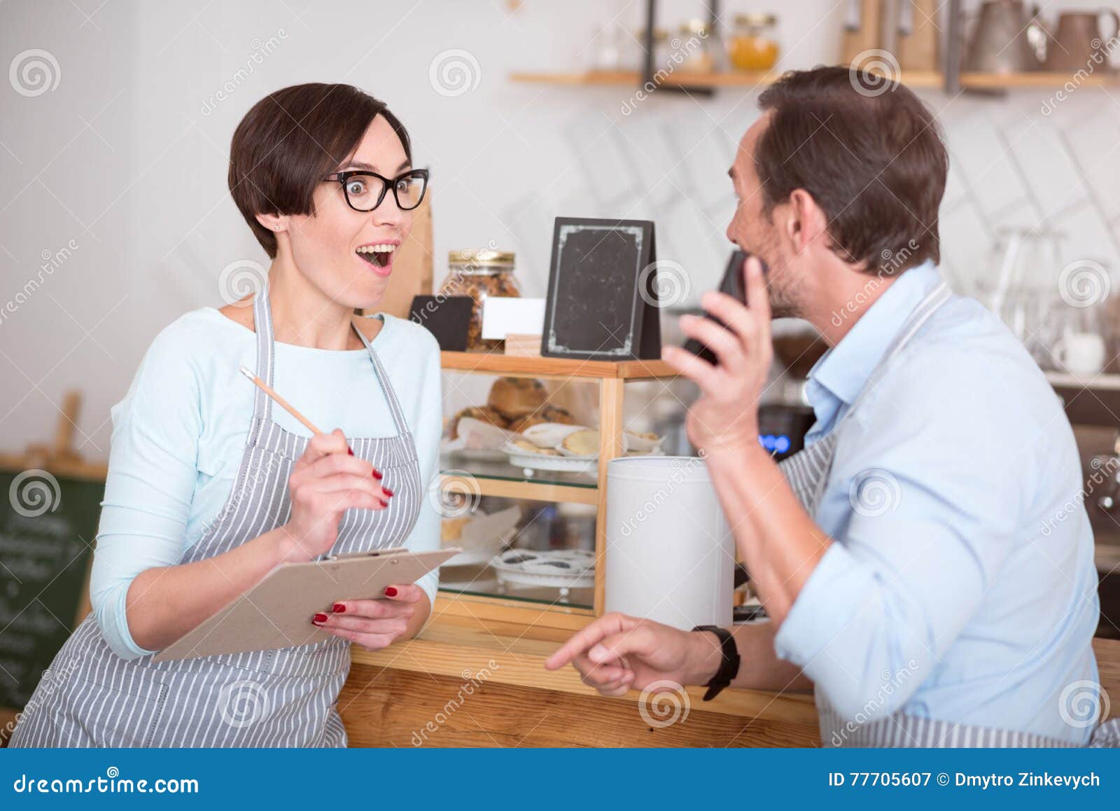 Two Waiters in Aprons Communicating in Cafe Stock Image - Image of cafe ...
