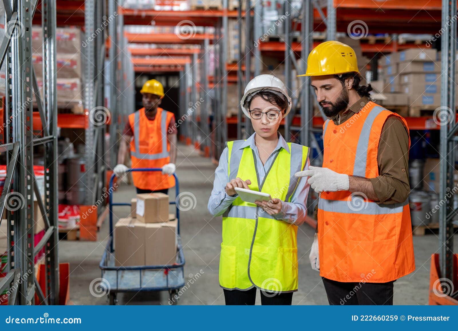 Two Warehouse Employees Discussing Working Points Stock Image - Image ...