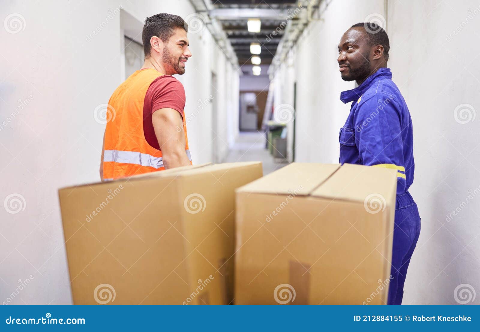 Two Warehouse Workers As a Multicultural Team Stock Image - Image of ...