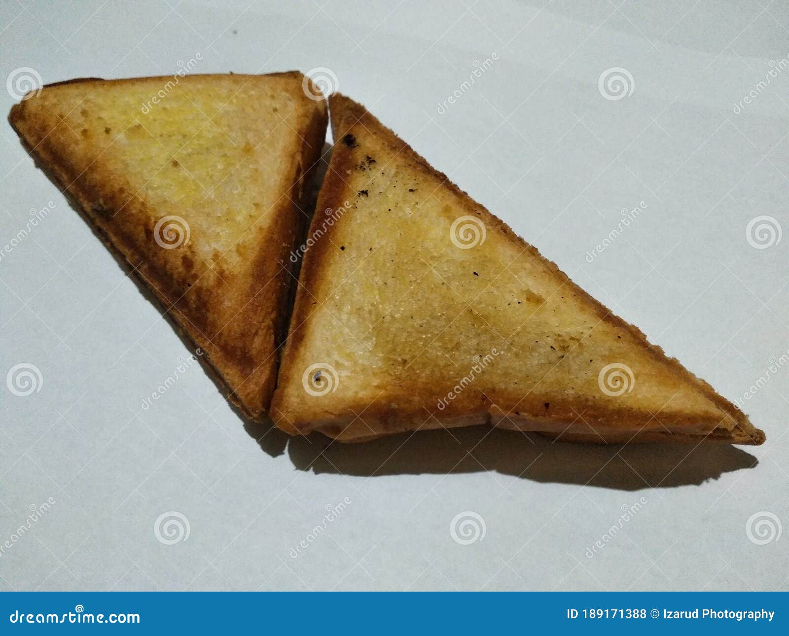 Two Warm Half-burnt Toast on a White Background. Stock Photo - Image of ...