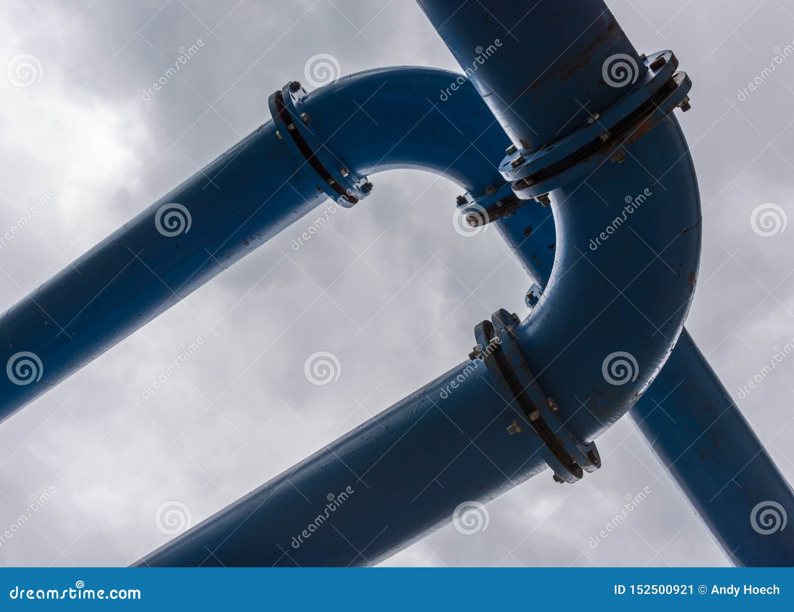 Two Water Pipes Overlap Under the Sky Stock Image - Image of iron ...