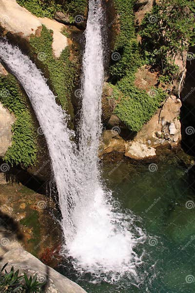 Two waterfalls meet stock image. Image of moisten, fluids - 59296115