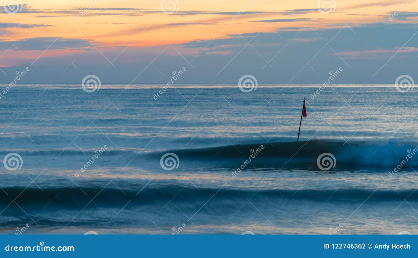 Two waves and a red flag stock photo. Image of minimalism - 122746362