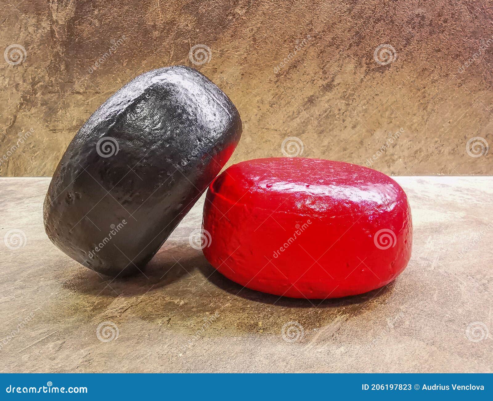 Two Wax-coated Cheese Wheels on the Table Surface Stock Image - Image ...