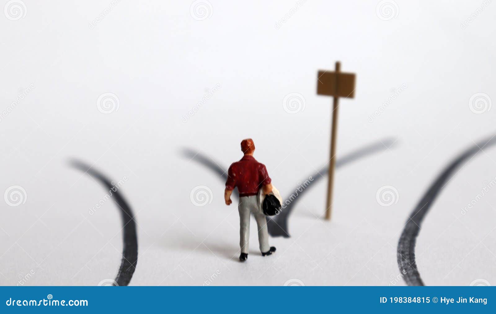 Two Way and a Miniature Man. Stock Image - Image of milestone, walking ...