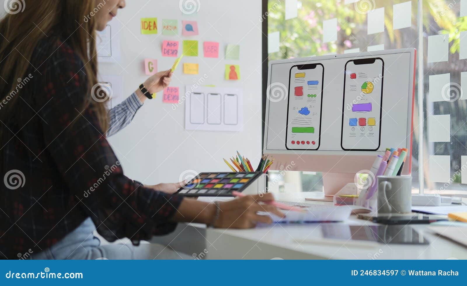 Two Web Designers are Working and Designing User Interface for Website ...